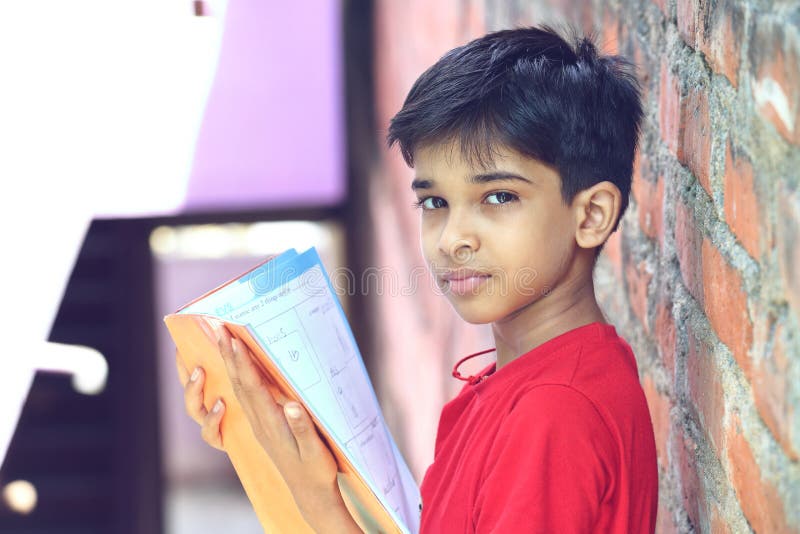 Indian Little Boy with Textbook Stock Image - Image of book ...