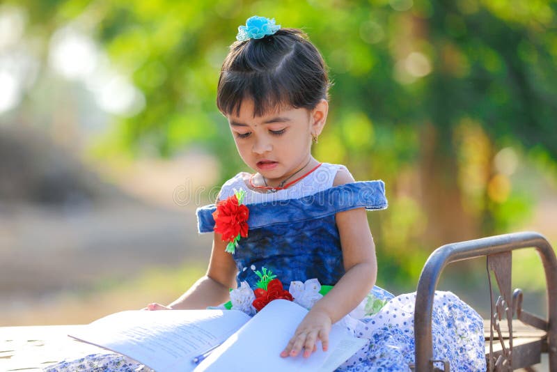 Indian Little Girl Child Writing on Note Book , Studying Stock Image ...
