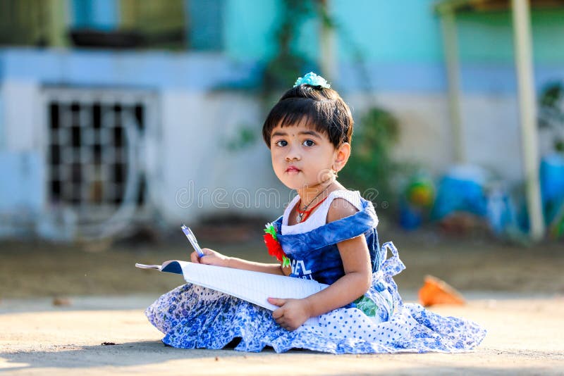 Indian Little Girl Child Writing on Note Book , Studying Stock Image ...