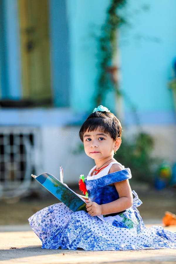 Indian Little Girl Child Writing on Note Book , Studying Stock Image ...