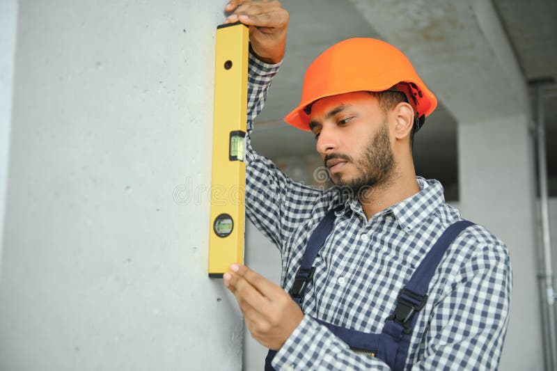 Indian Male Construction Worker Standing in Uniform and Hard Hat at ...