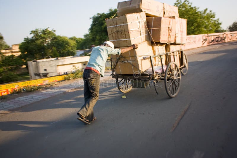 Indian Man Carrying Boxes on Hand Cart Editorial Photo - Image of ...