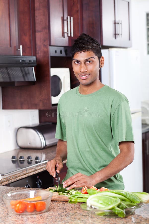 Indian man cooking stock image. Image of male, cooking - 23391671