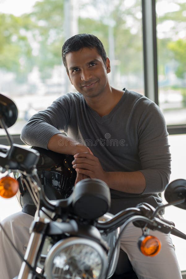 Indian man on motorbike stock image. Image of rider, motorbike - 51907217