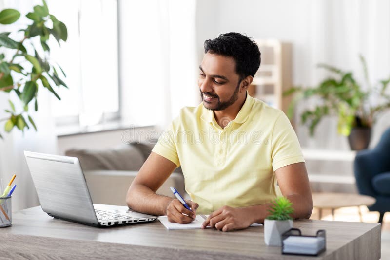Indian Man with Notebook and Laptop at Home Office Stock Image - Image ...