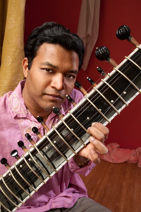 Indian Man Plays a Sitar stock photo. Image of classic - 18992148