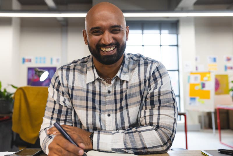 Indian Man Smiling Looking at the Camera during a Video Call at Office ...