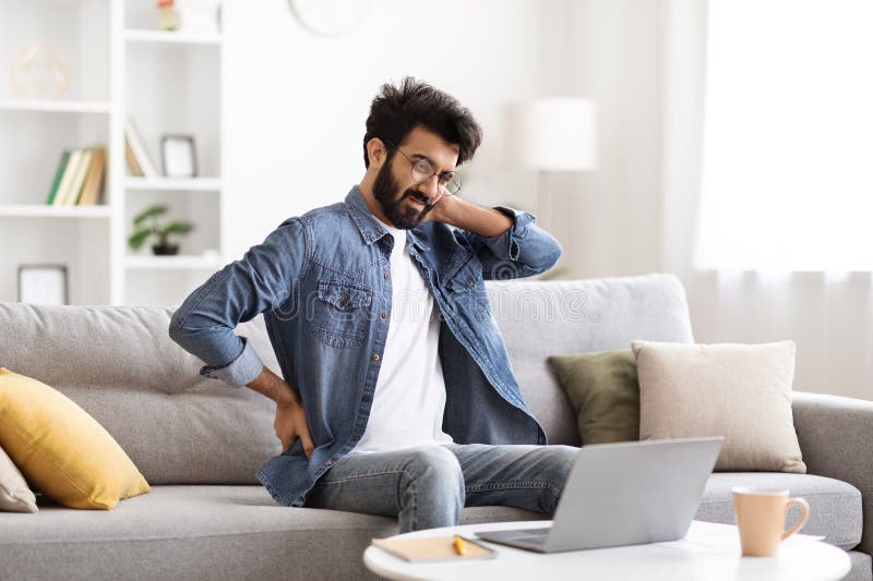 Indian Man Suffering Backache and Neckache after Working with Laptop at ...