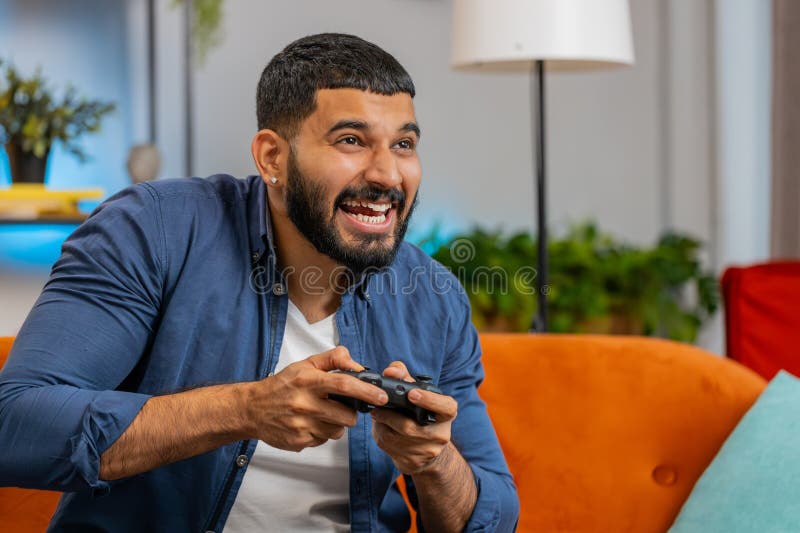 Indian Man Using Joystick Controller Playing Video Console Winning ...