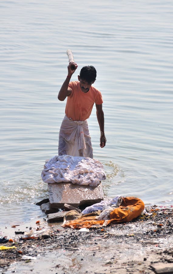 Indian Man Washing Clothes editorial stock photo. Image of ghat - 27847988