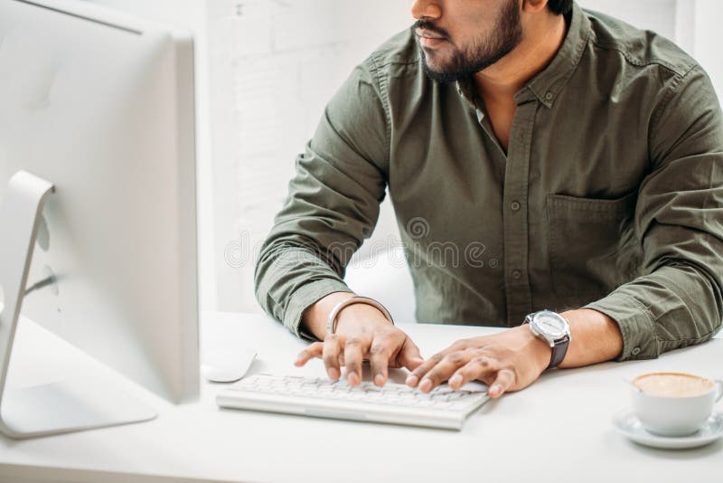 Indian Man Working at Computer from Modern Bright Office Stock Image ...