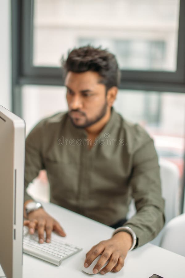 Indian Man Working at Computer from Modern Bright Office Stock Photo ...