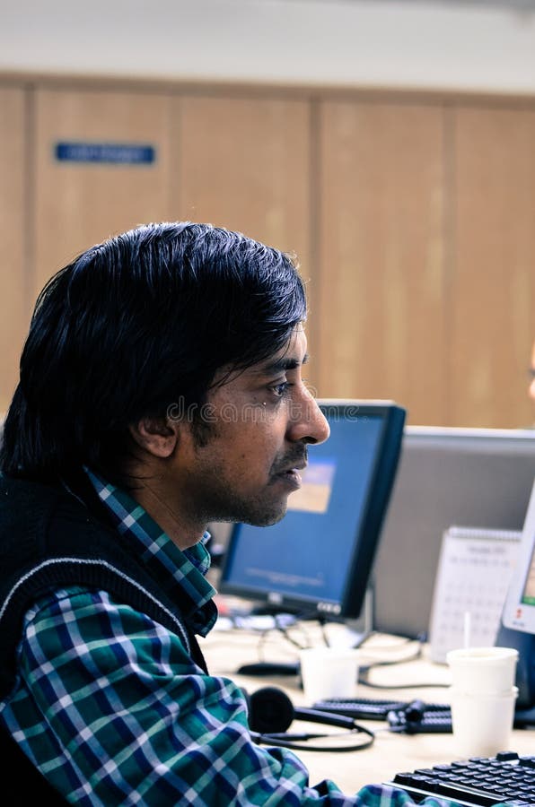 Indian Man Working at Office with Full Concentration Stock Photo ...