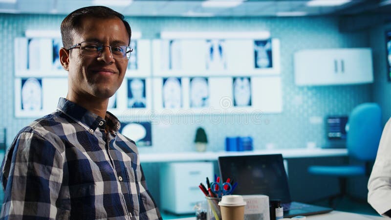 Indian Medic Explaining Diagnostics through Test Results with Her ...