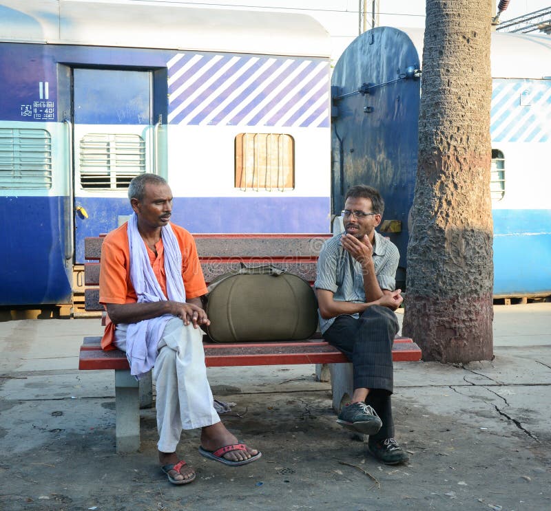 Indian Men Waiting at the Train Station in Varanasi, India Editorial ...