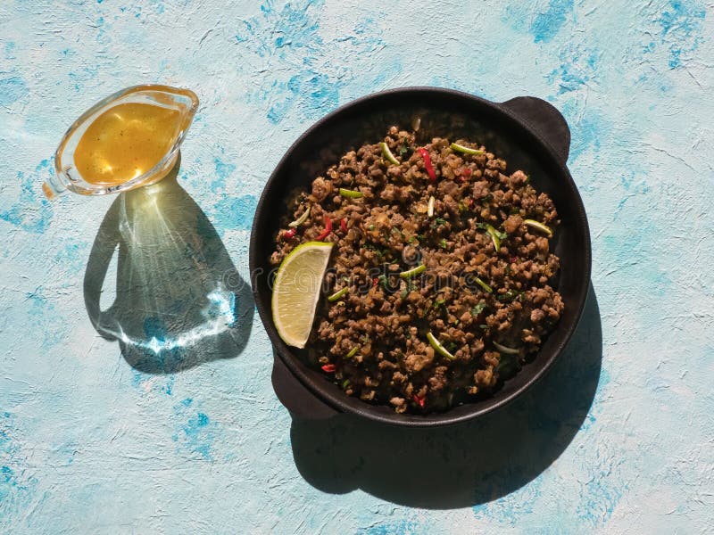 Indian Minced Meat Qeema on a Sunny Blue Table. Stock Photo - Image of ...