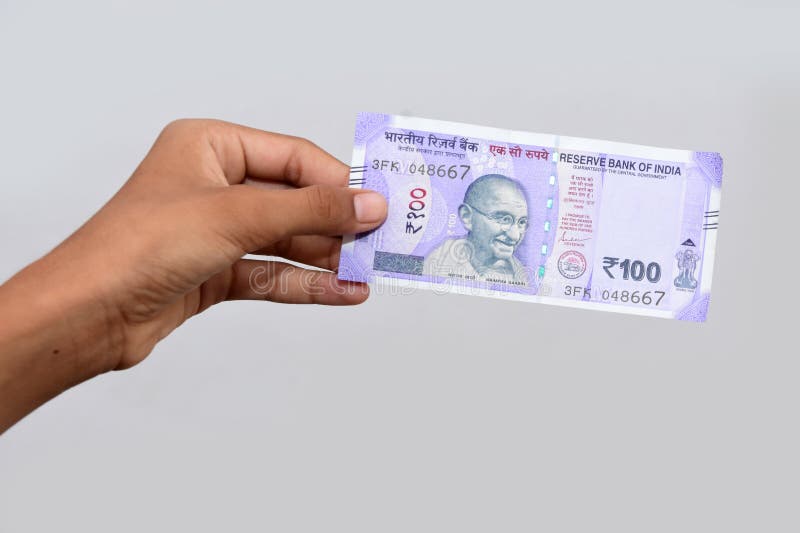 Hand Hold Indian Currencies 100 and 200 Rupee Notes White Background ...