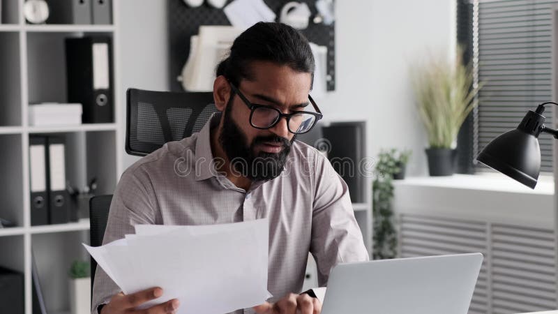 Focused Office Worker Immersed in Tasks at Workspace Stock Footage ...