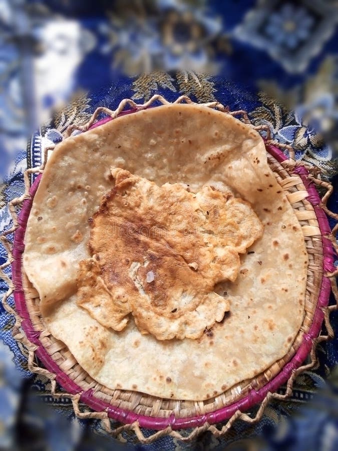 Pakistani Breakfast Paratha Omelette with Two Tea Cups in Tray Stock ...