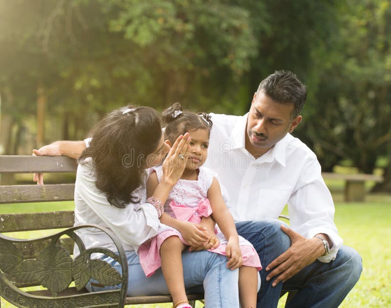 Indian Parent Dealing with Daughter with Stock Photo - Image of ...