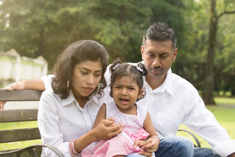Indian Parent Dealing with Daughter Stock Photo - Image of care, hurt ...