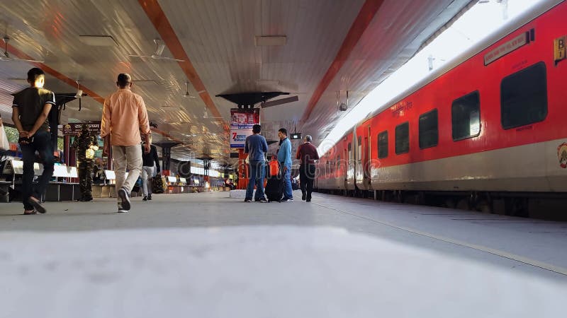 Indian Passenger Train Standing at Station with Passenger Walking at ...
