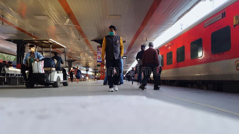 Indian Passenger Train Standing at Station with Passenger Walking at ...