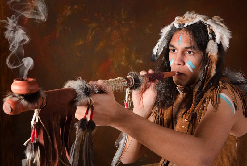 Indian with peace pipe stock image. Image of indigenous - 14390499