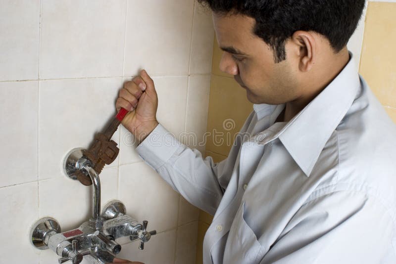Indian Plumber Working On Tap Stock Photo - Image of employed, self ...