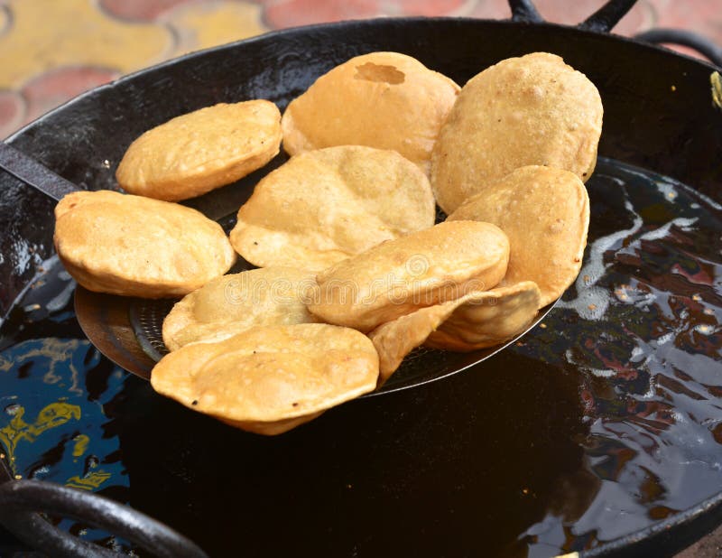 Indian poori being made stock image. Image of white, frying - 48375091
