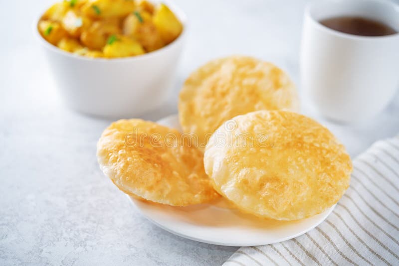 Poori Set or Puri with Chnnay and Veg Curry with Chutney, Raita and ...