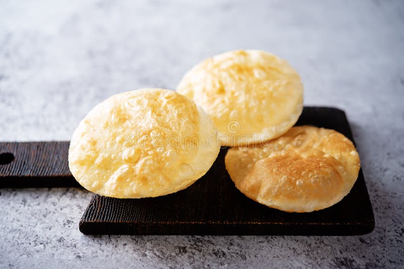 Poori Set or Puri with Chnnay and Veg Curry with Chutney, Raita and ...