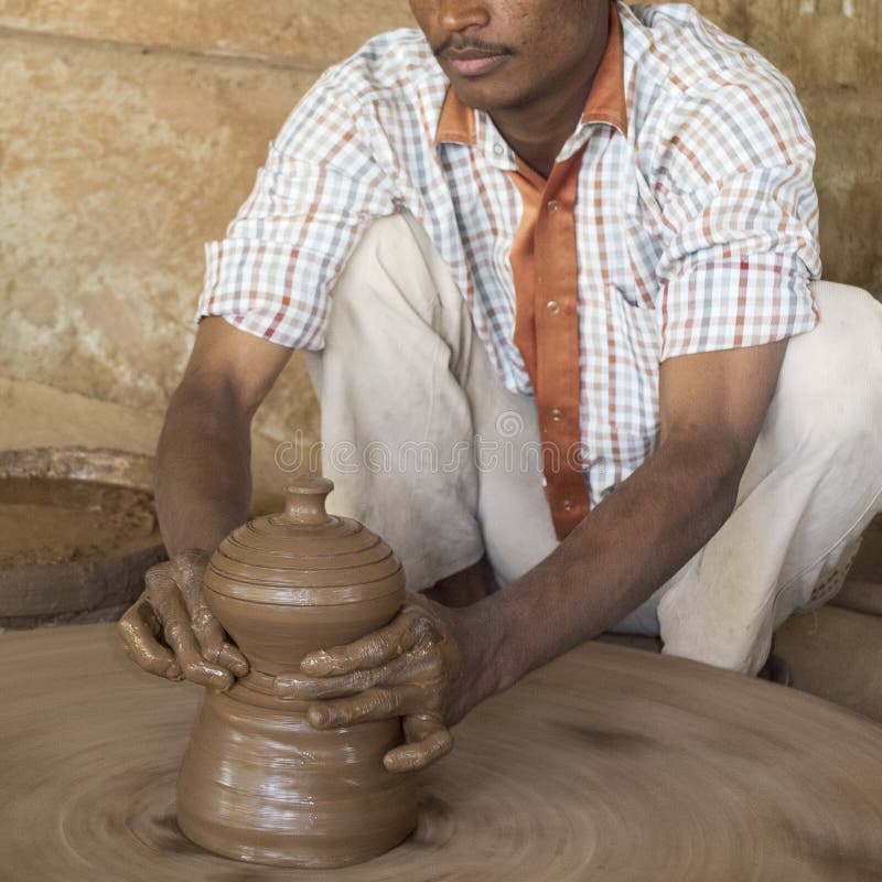 Indian Potter Making Clay Pots on Pottery Wheel in Dharavi Slum at ...