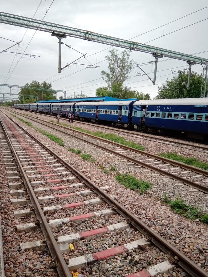Indian Railway Tracks and Train and People Inside Train Editorial ...