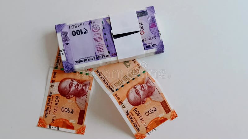 Indian Rupee 100 Currency Note Bundles and Rupee 200 Notes Isolated on ...