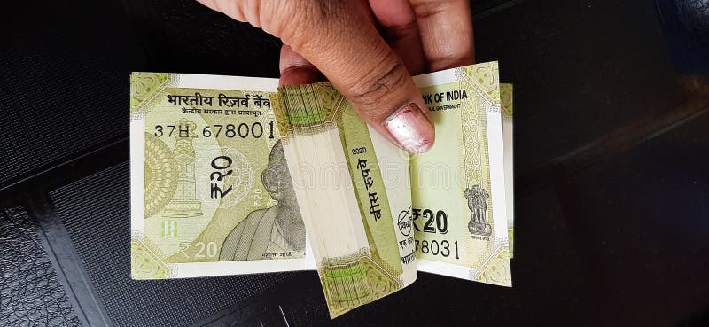 Indian 20 rupee note stock photo. Image of finance, coin - 247984132