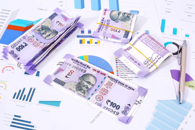 Indian 10 Rupee Notes and Pen on the Chart Paper Stock Photo - Image of ...