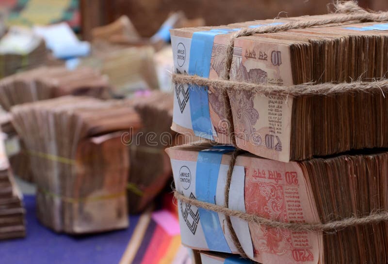 Stack Of Indian Currency Coins And Notes And Hand Stock Photo - Image ...