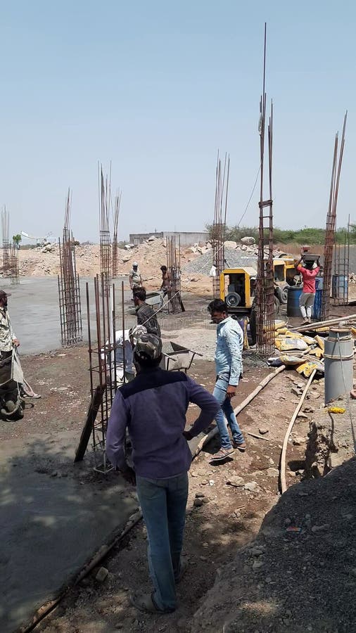 Video of Indian Worker Mixing Cement and Concrete for a Construction ...