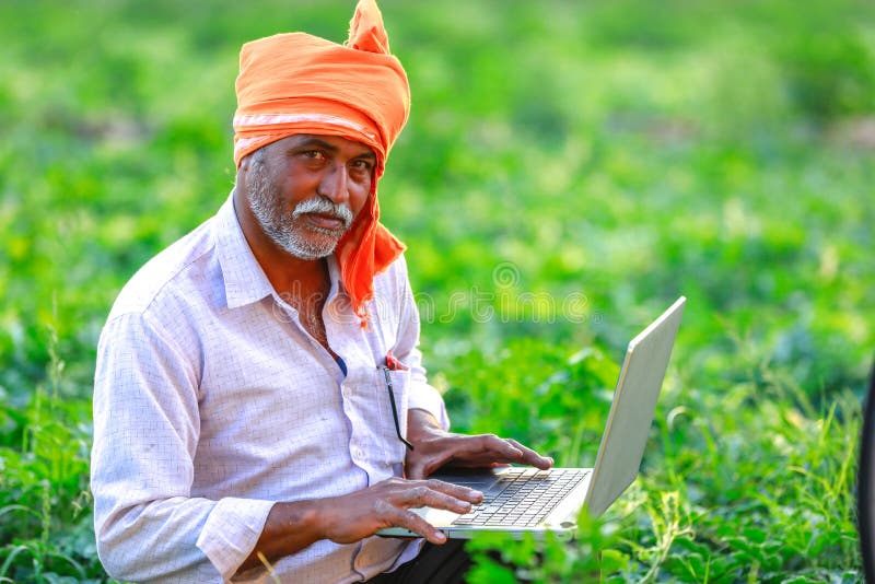 Indian Rural Farmer Using Laptop Stock Image - Image of happy, computer ...