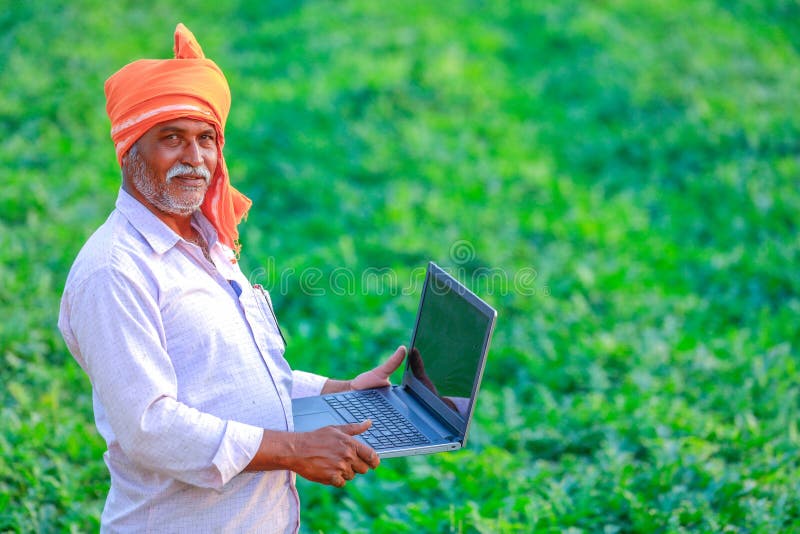 Indian Rural Farmer Using Laptop Stock Photo - Image of agronomist ...
