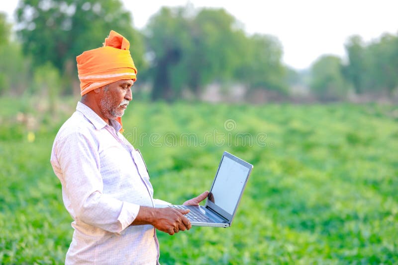 Indian Rural Farmer Using Laptop Stock Photo - Image of agronomist ...