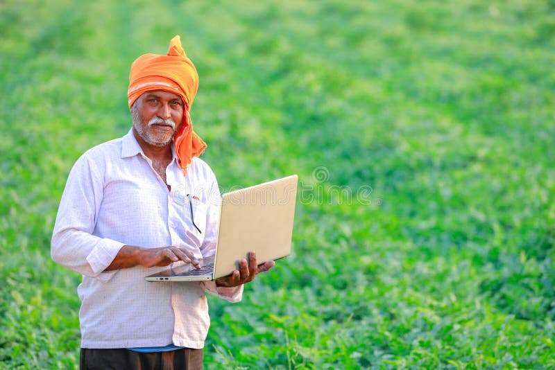 Indian Rural Farmer Using Laptop Stock Photo - Image of culture, kurta ...
