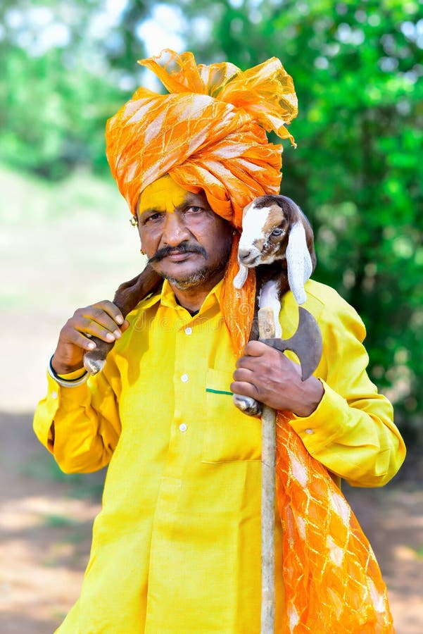 Indian Rural Man Holding Baby Sheep in His Hands Traditional Dress ... Indian Rural Man Holding Baby Sheep in His Hands Traditional Dress ...