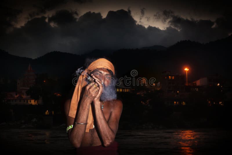 Indian Sadhu Smoking Hashish Stock Photo - Image of dependency ...