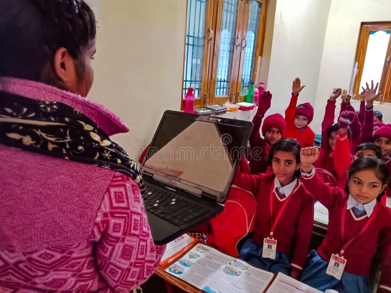 An Indian School Computer Trainer Teaching about Internet Technology To ...