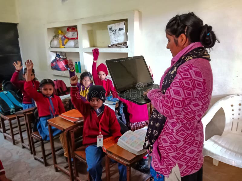 An Indian School Computer Trainer Teaching about Internet Technology To ...
