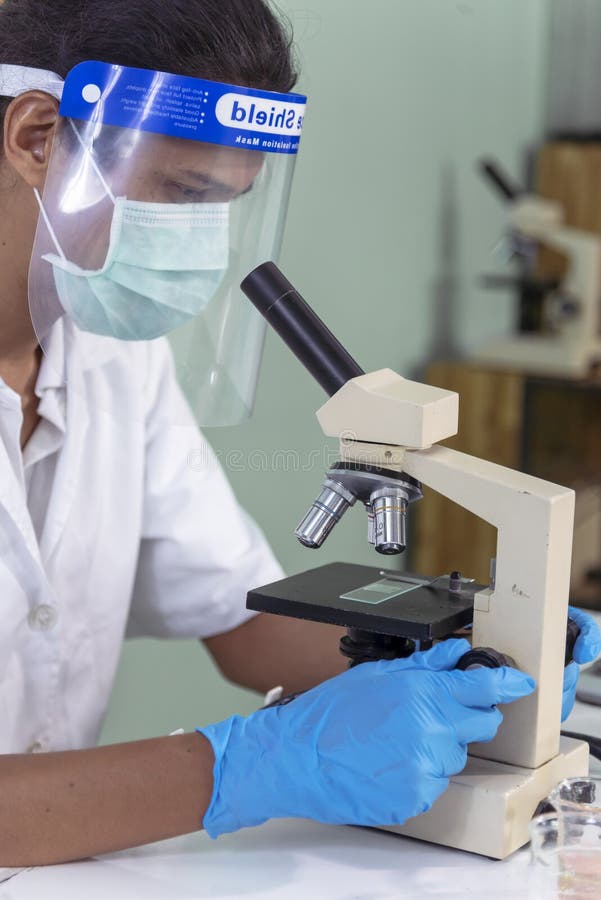 119 Indian Doctor Using Microscope Stock Photos - Free & Royalty-Free ...
