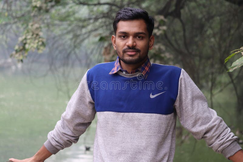 Indian Smart Boy Arms Crossed Looking at Camera in Backyard Stock Image ...