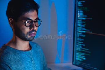 Indian Software Development Working on Coding Computer Screen and Flowchart at Night in Modern ...